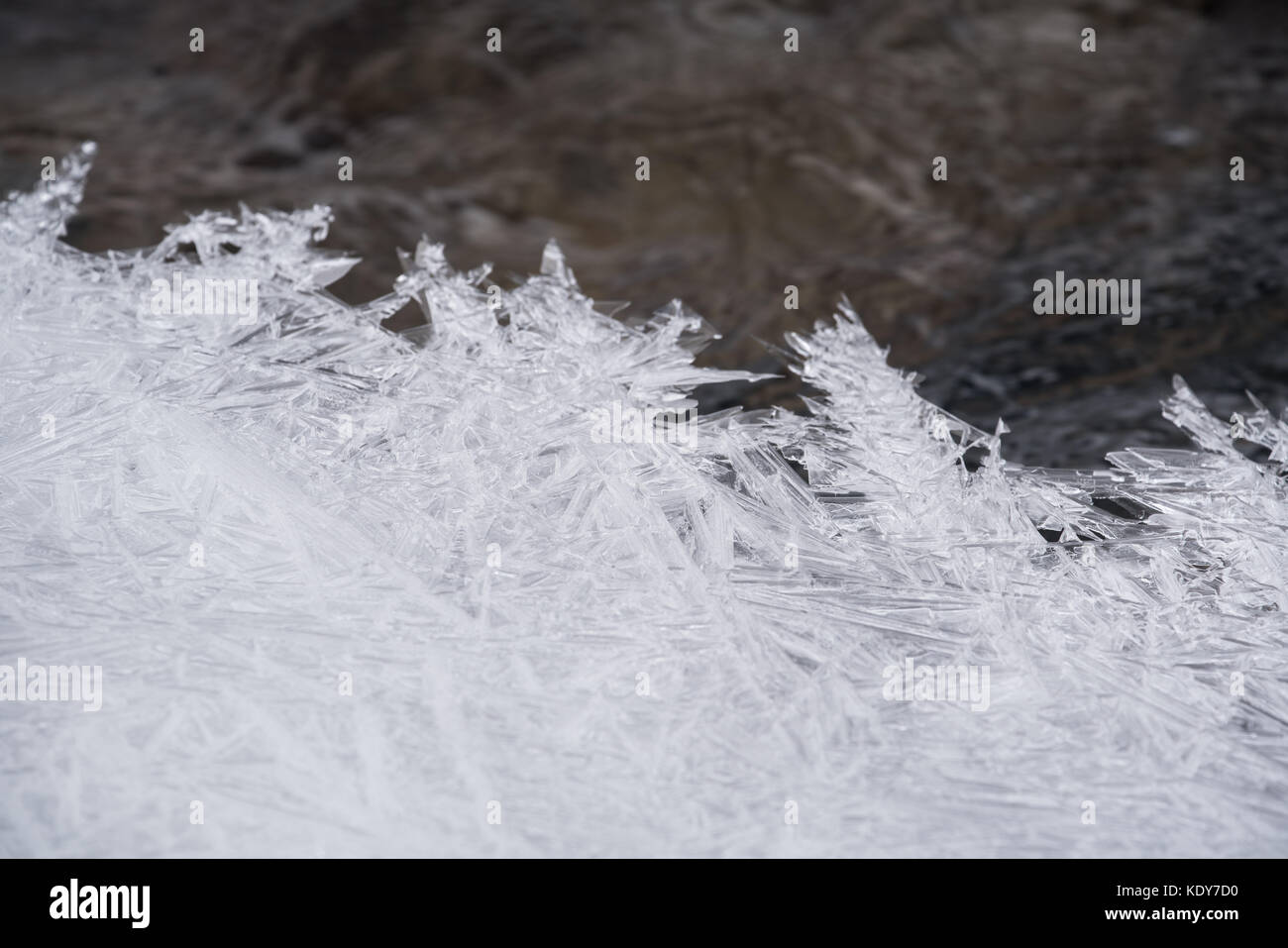 Texture of snow and ice flake from frozen place in nature at Zero-Point ...