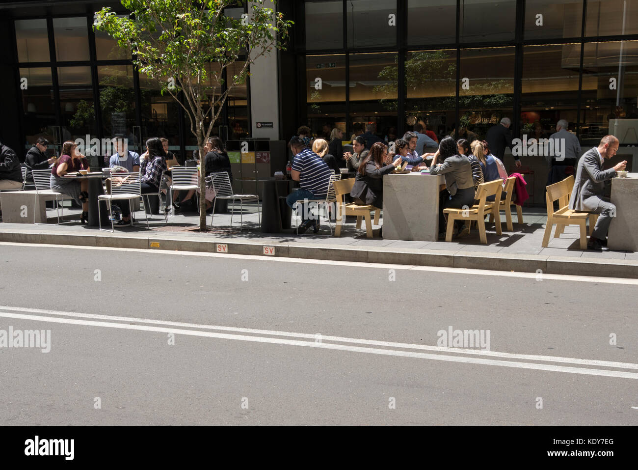 People eating lunch on outside on the street in barangaroo Stock Photo ...