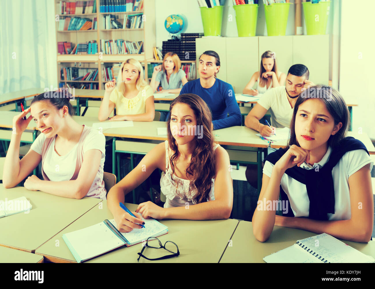Student listening attentively during lecture in the classroom Stock ...