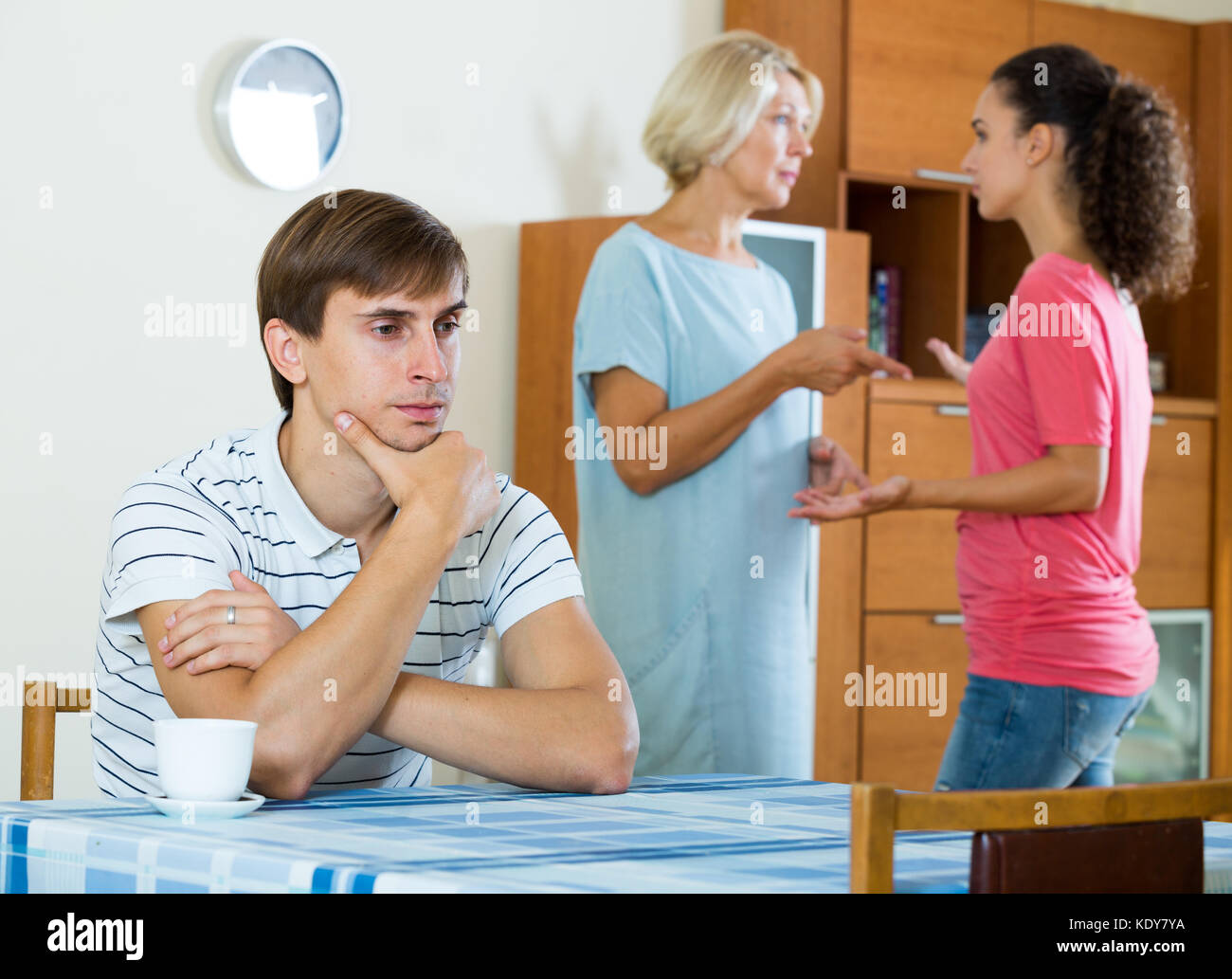 Young man suffering of domestic fight between family members Stock ...
