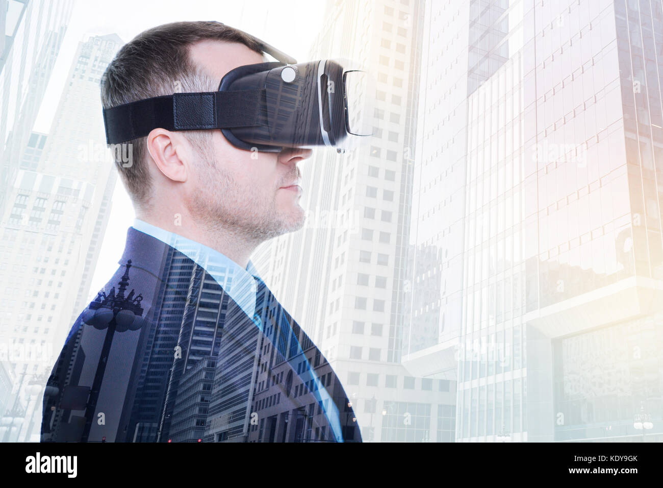 Side view of businessman in suit wearing VR headset Stock Photo - Alamy