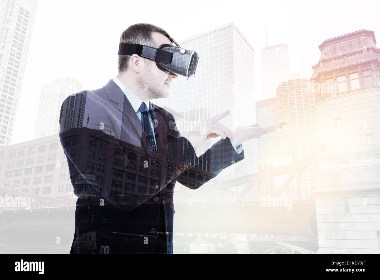 Smiling businessman interacting with VR object on his palm Stock Photo ...