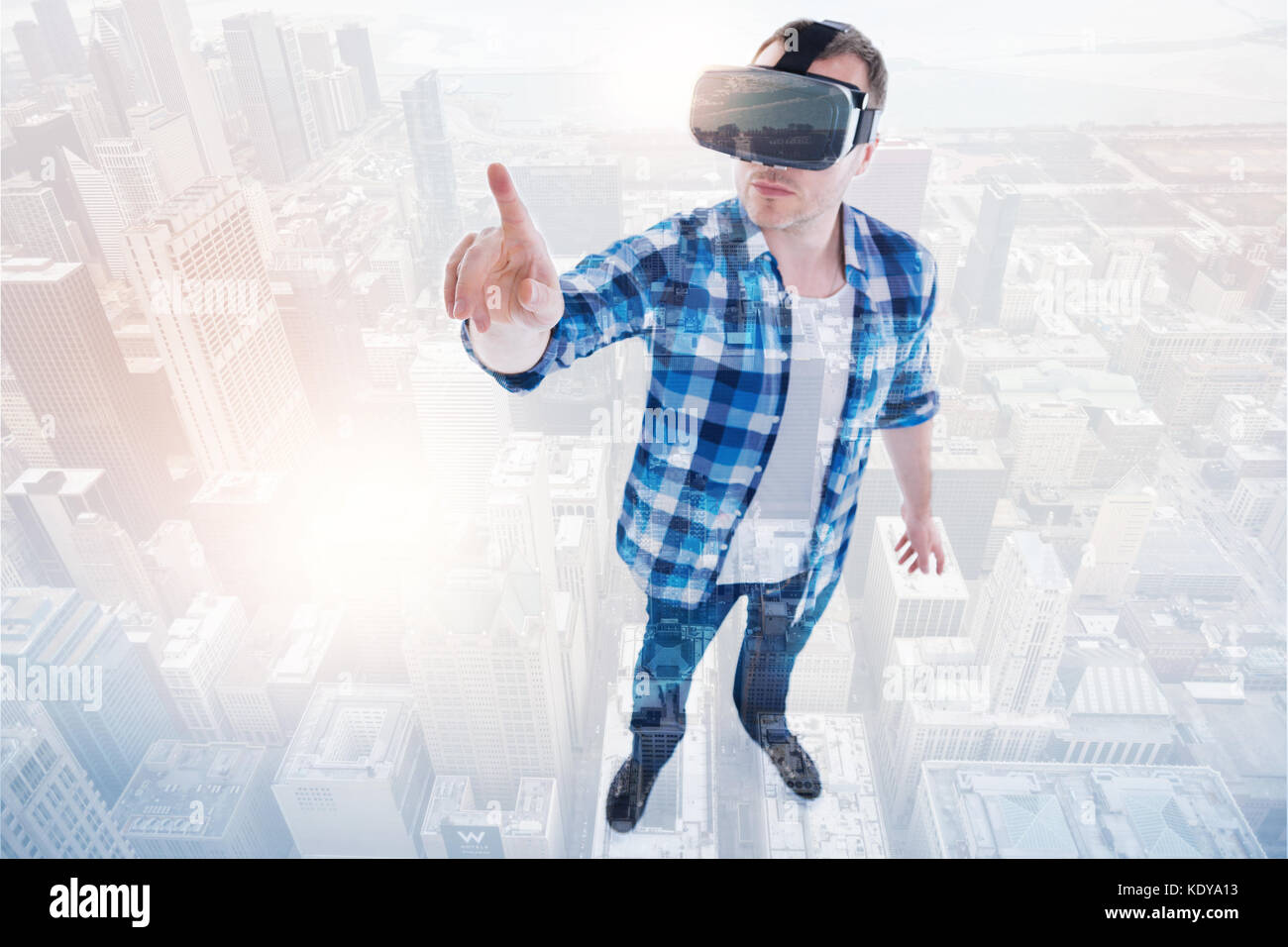 Top view of young man playing VR game Stock Photo - Alamy