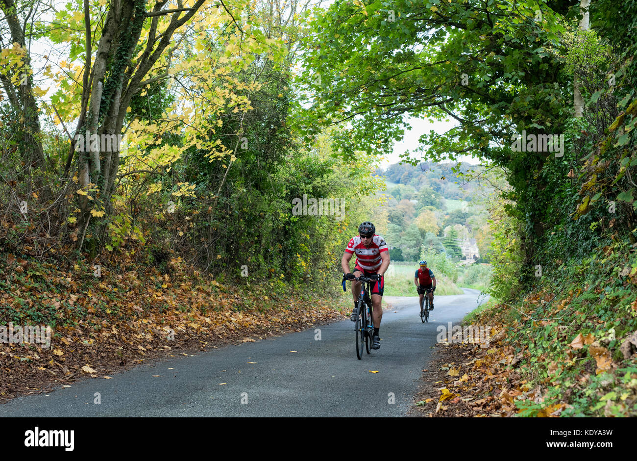 English village lane cyclist hi-res stock photography and images - Alamy