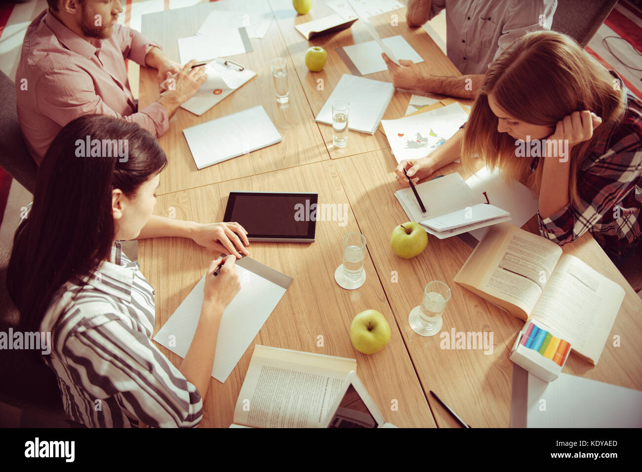 Top view of smart young people working Stock Photo - Alamy
