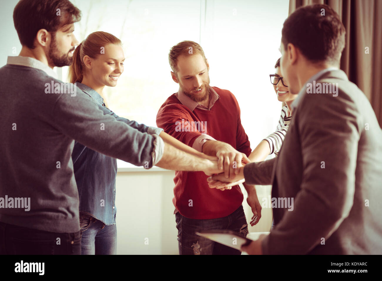 Happy nice team being ready to work Stock Photo - Alamy
