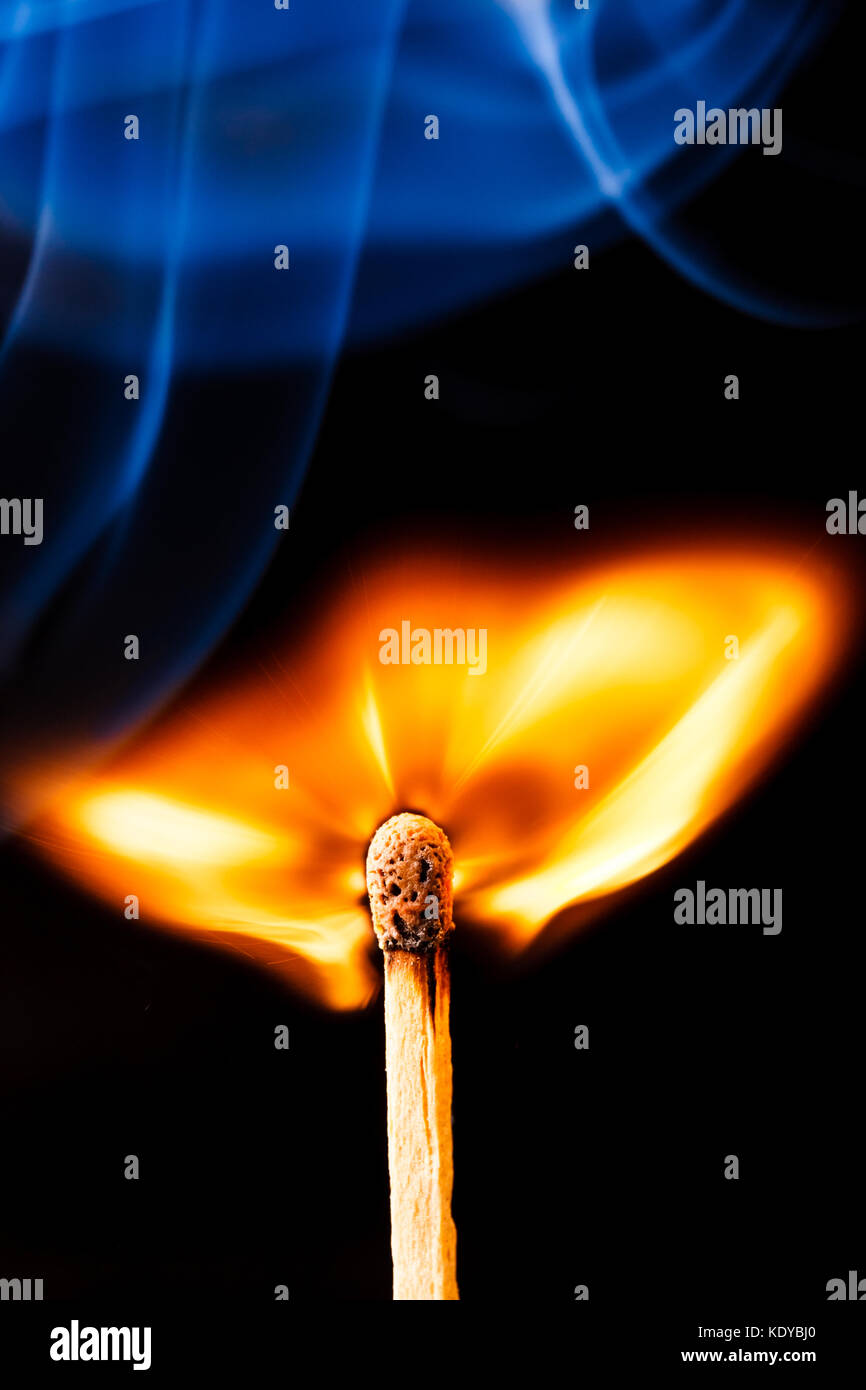 burning wooden kitchen matchstick ignition on black background macro ...