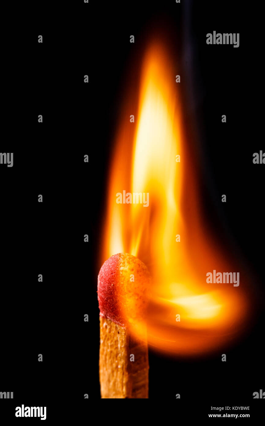 burning wooden kitchen matchstick ignition on black background macro ...