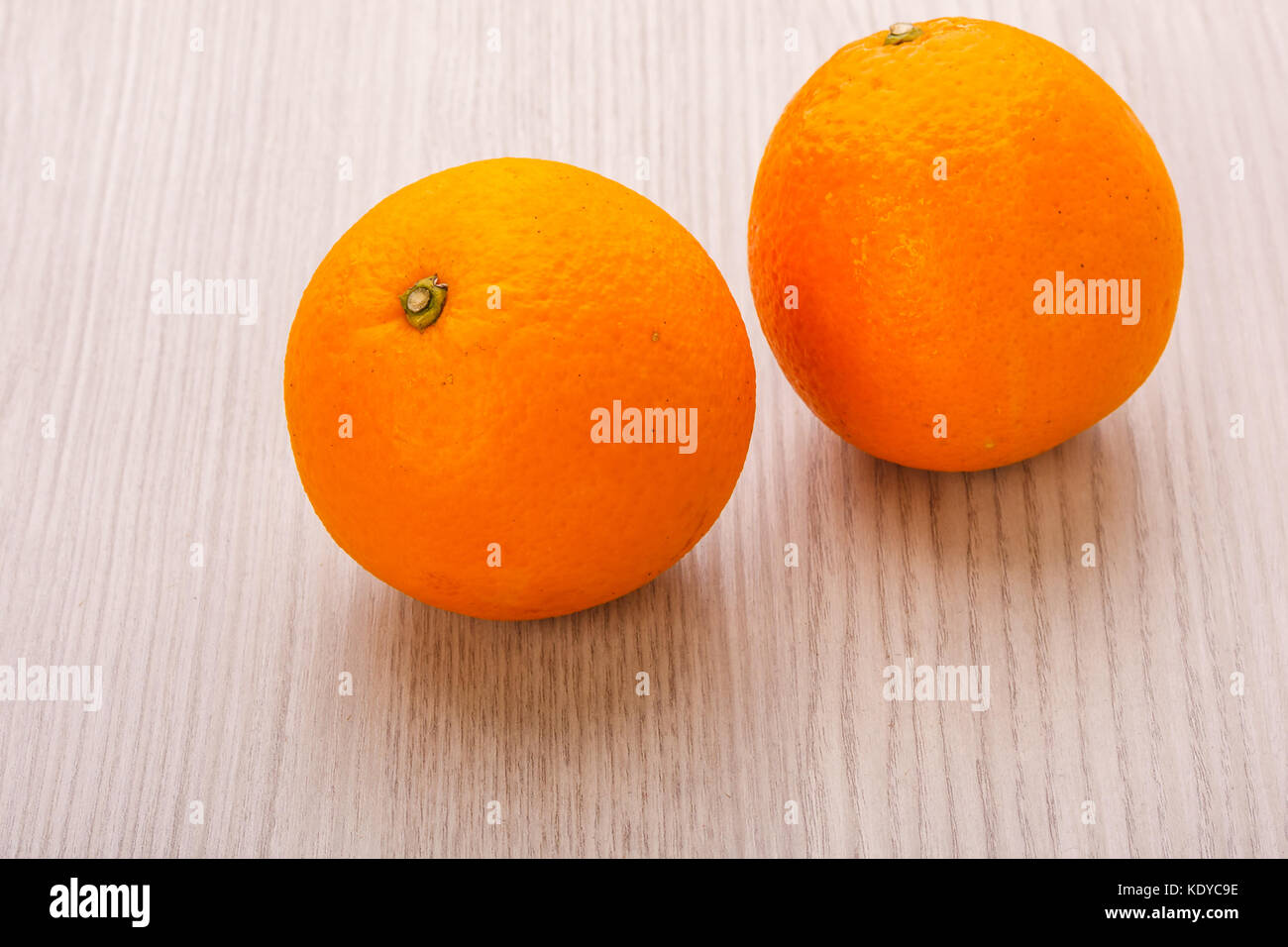 valencia orange or navel orange on wood background Stock Photo - Alamy