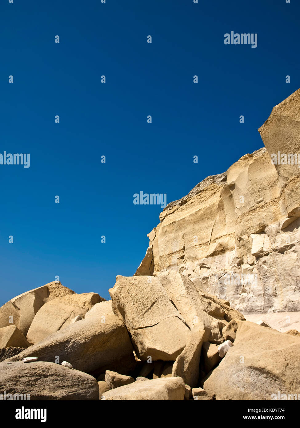 Beautiful and unique eroded sandstone cliff faces at Qbajjar in Gozo ...