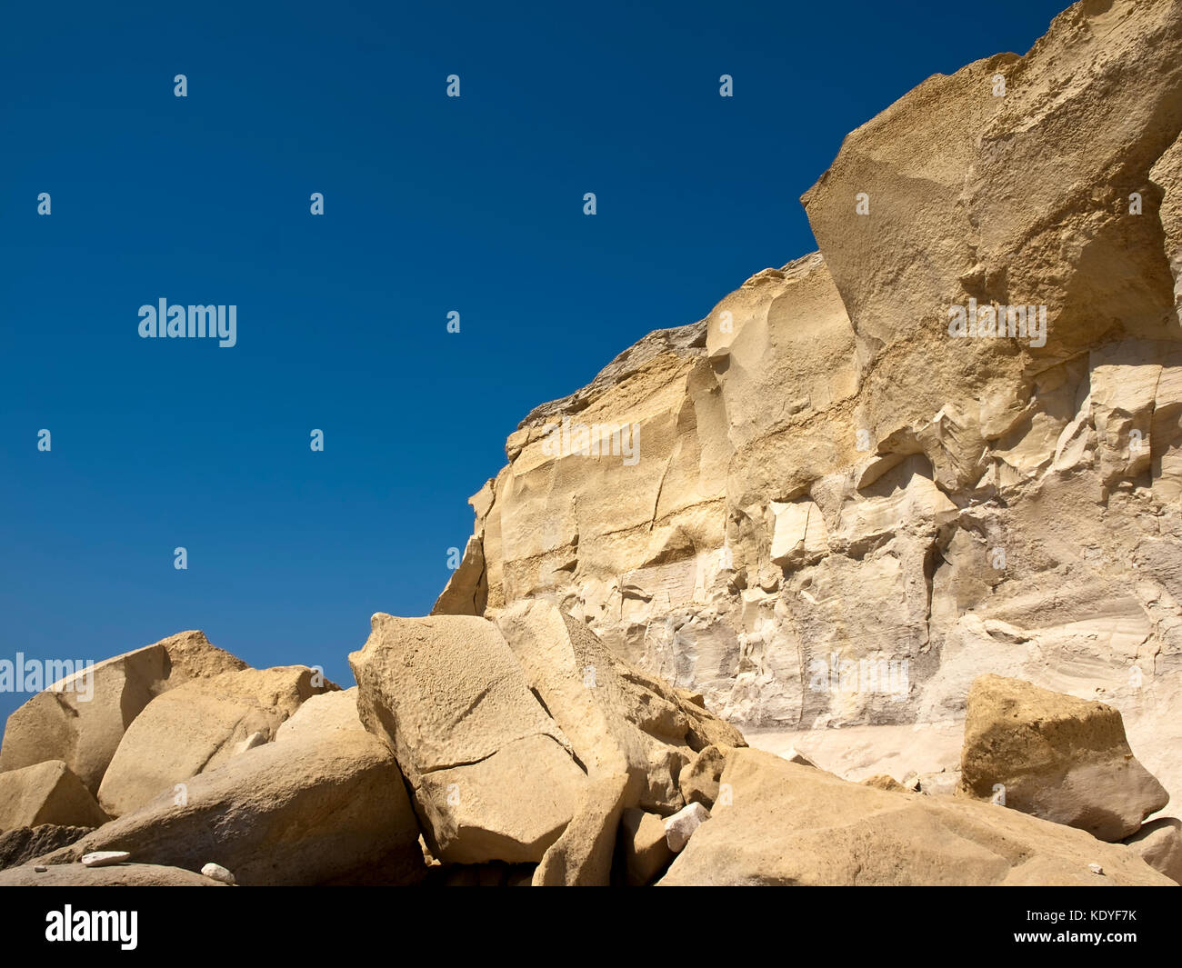 Beautiful and unique eroded sandstone cliff faces at Qbajjar in Gozo ...