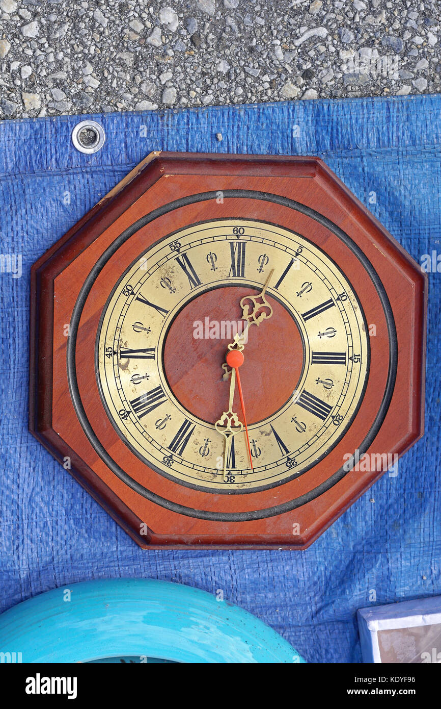 Octagonal wall clock with wood Stock Photo - Alamy