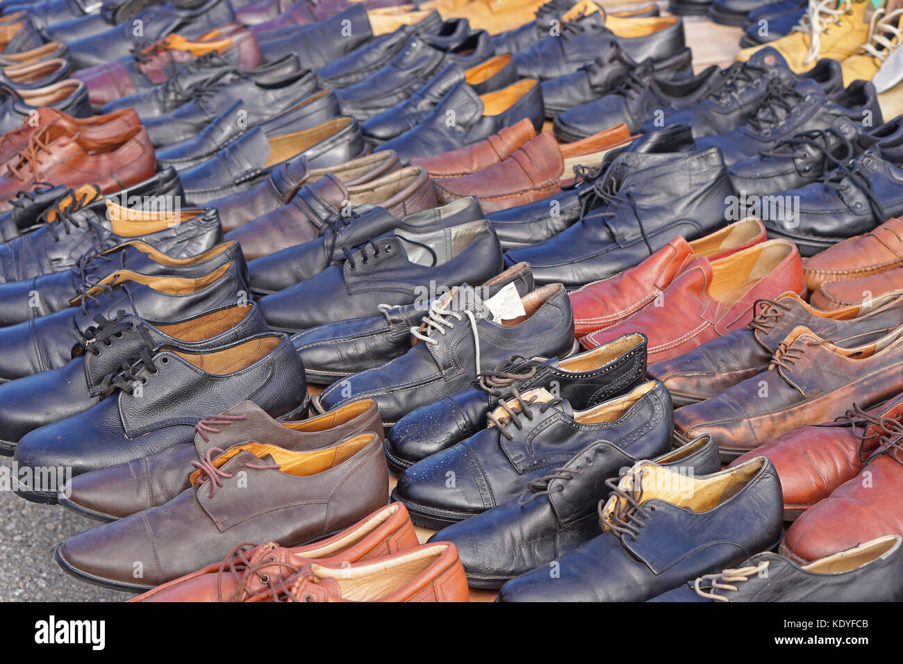 Used second hand leather shoes Stock Photo - Alamy