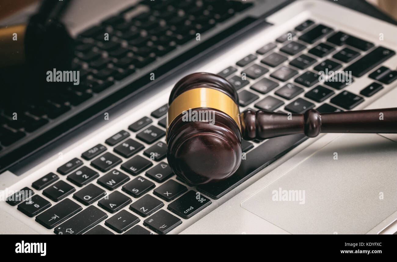 Online auction concept. Auction or judge gavel on a computer keyboard ...