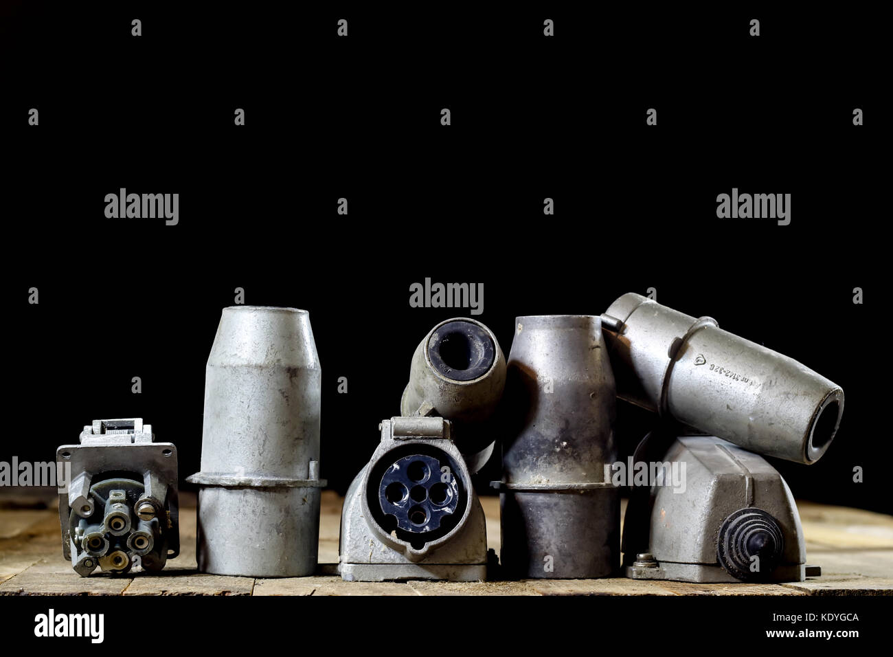 Old plug and socket high voltage. Old electrical accessories. Wooden ...