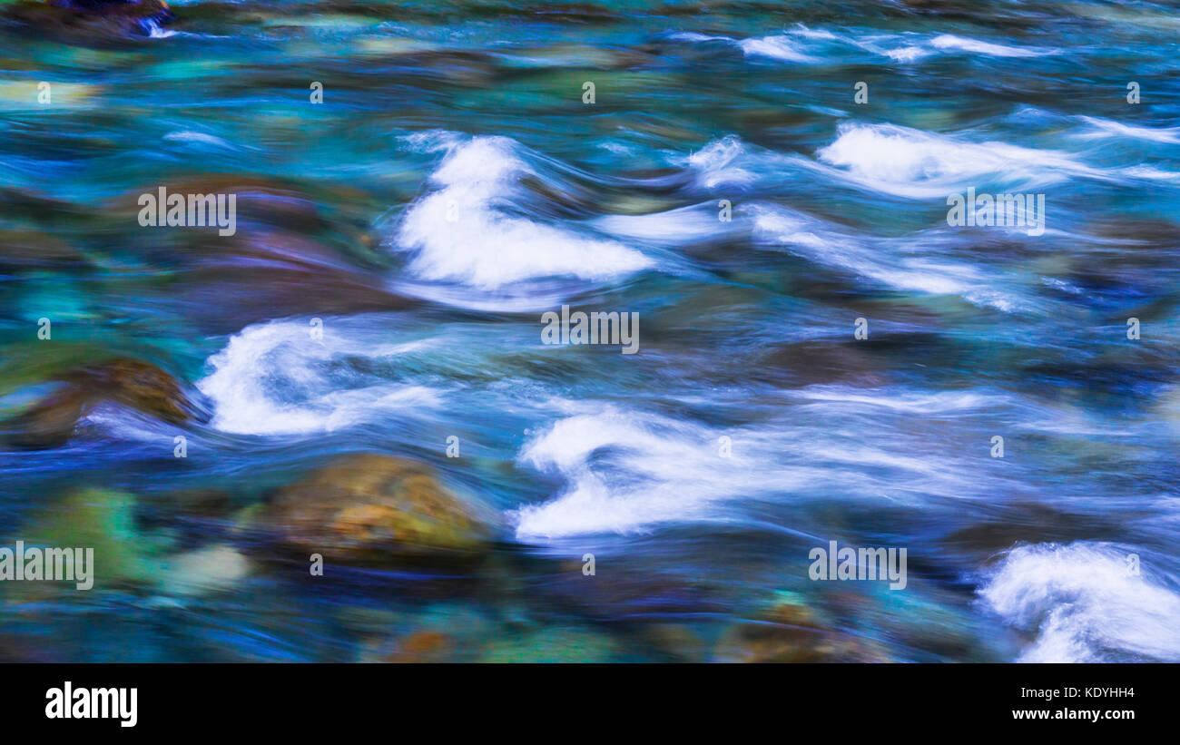 Azure waters of Ohanapecosh River in Mt. Rainier National Park ...