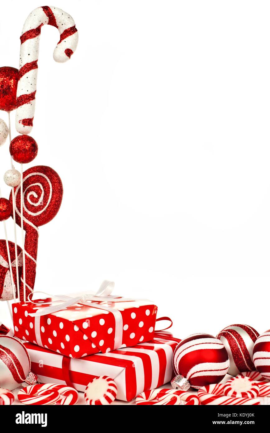 Red and white Christmas corner border with gifts, baubles and candy ...