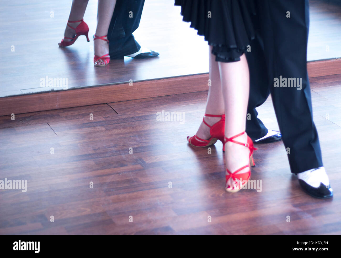 Ballroom dance couple of dancers and teachers in studio school dancing ...