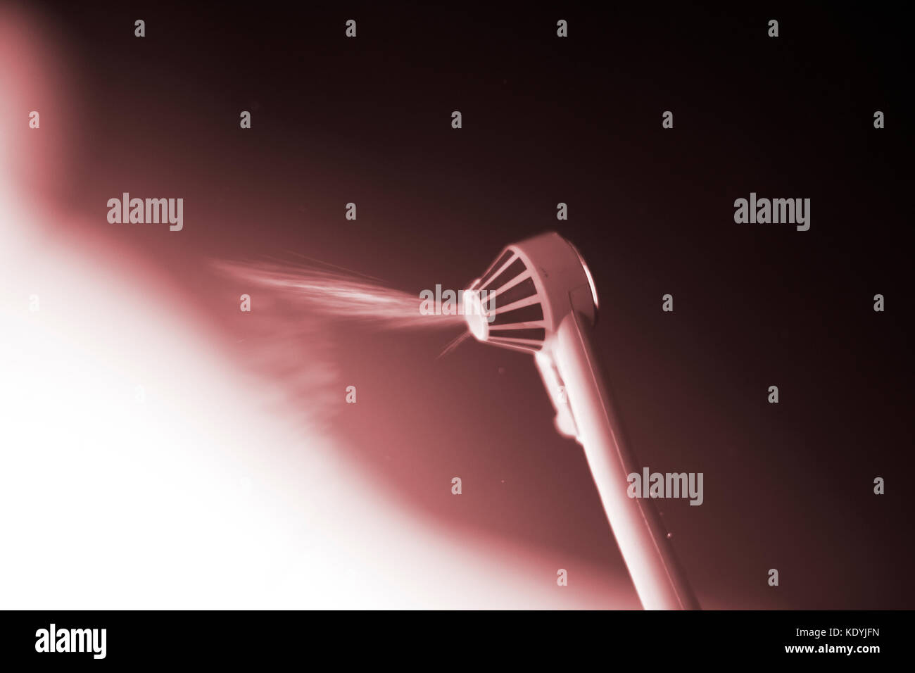 Dental water spray cleaner for interdental hygiene Stock Photo - Alamy