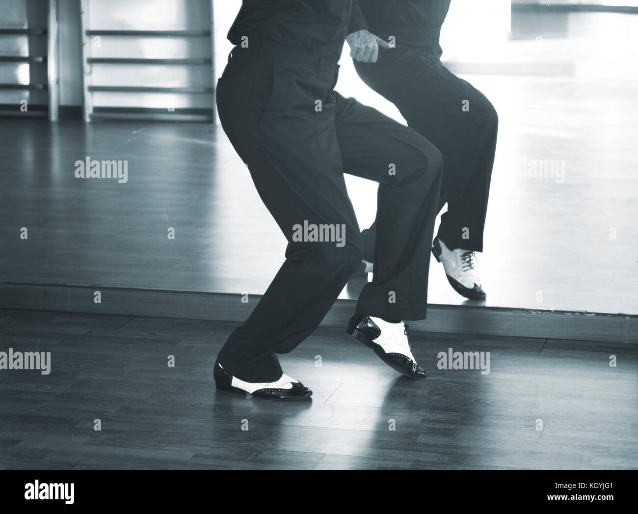 Ballroom dance male dancer and teacher in studio school dancing in ...