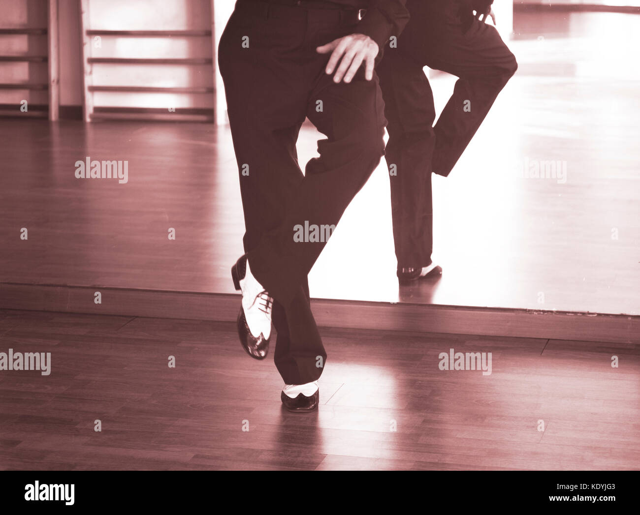 Ballroom dance male dancer and teacher in studio school dancing in ...