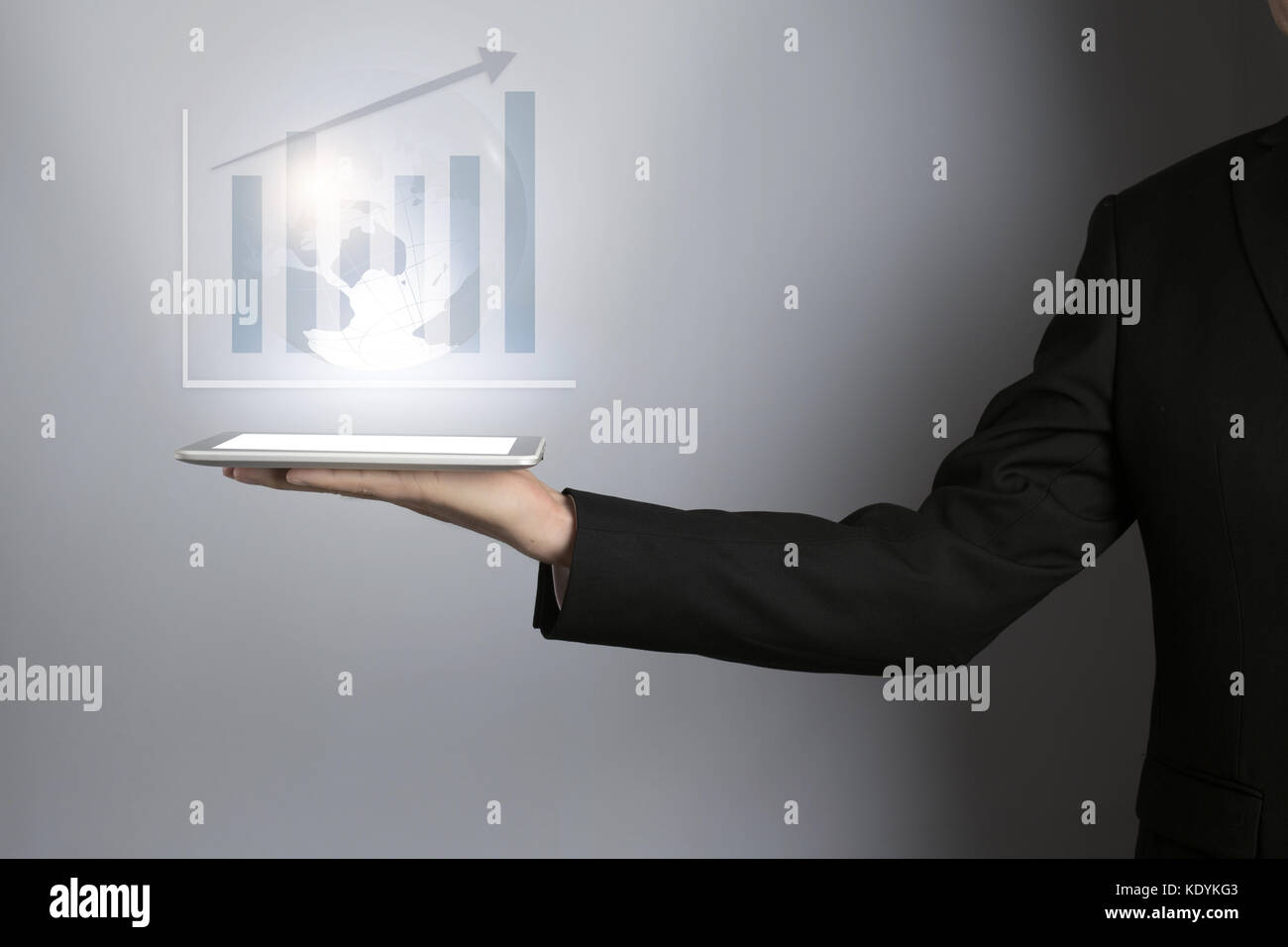 Business man holding a pad Stock Photo - Alamy