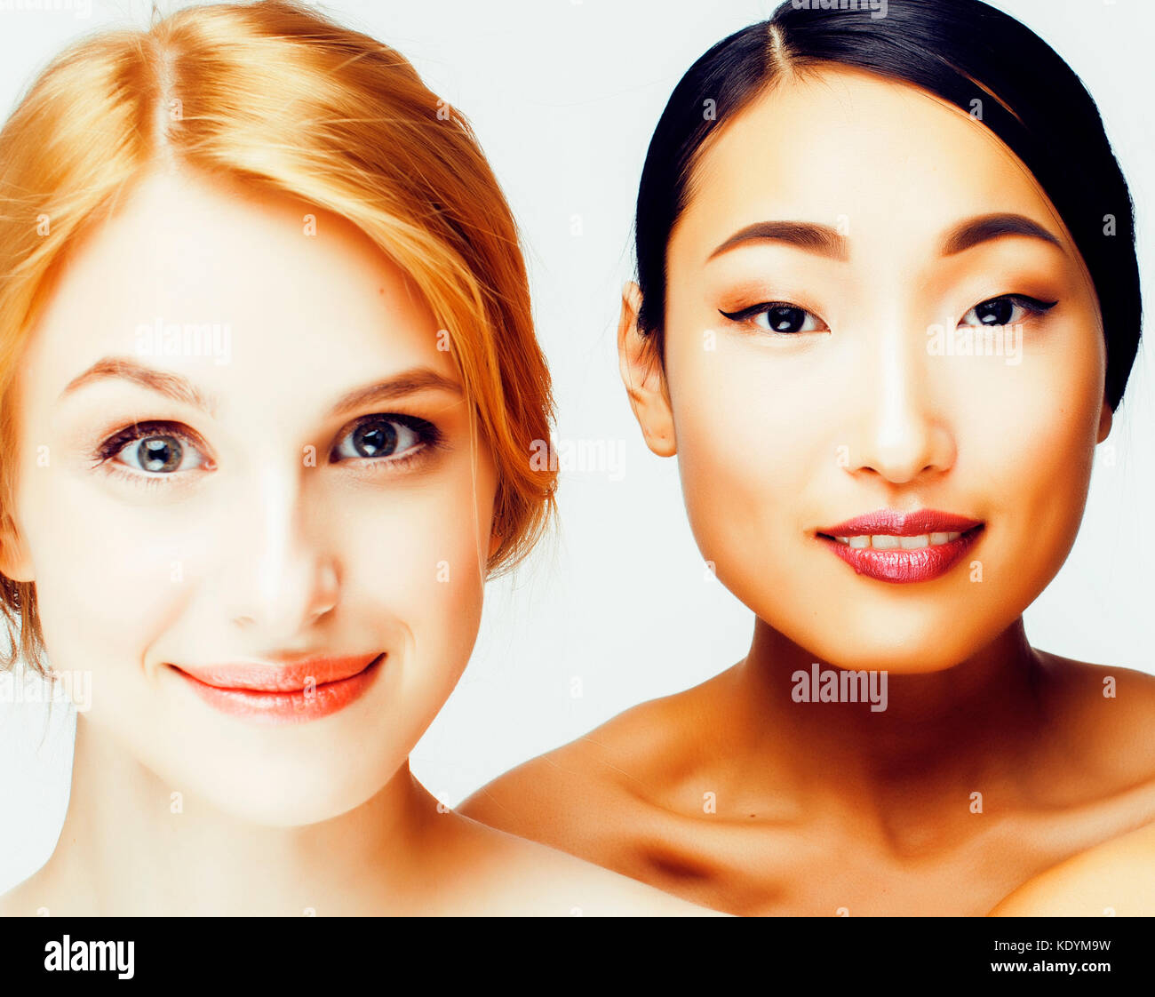 different woman: asian, caucasian together isolated on white background ...