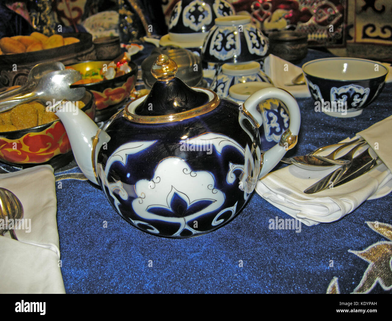 A traditional and colourful china tea set on display at an exhibit in ...