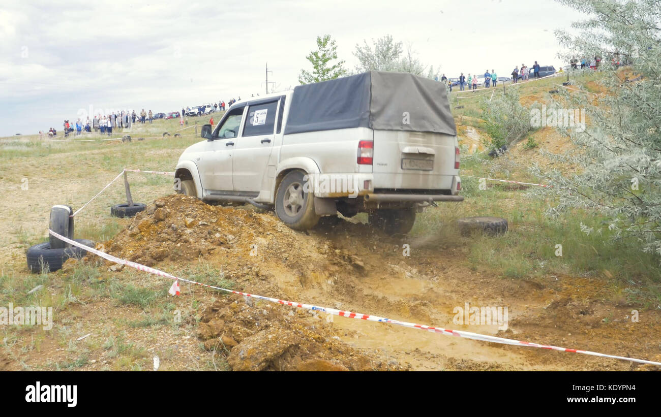 Moscow, Russia 9 June: SUVs race on dirt. Driver competing in an off ...