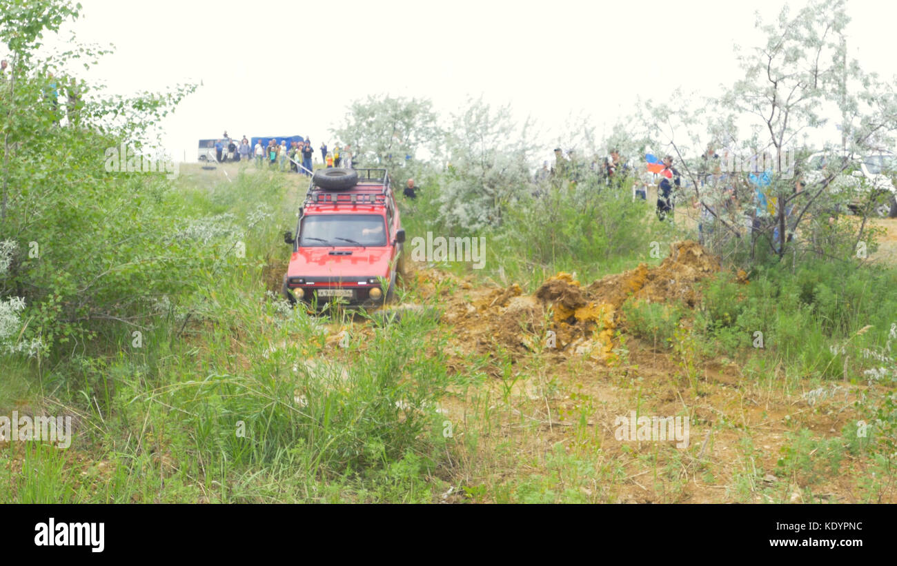 Moscow, Russia 9 June: SUVs race on dirt. Driver competing in an off ...