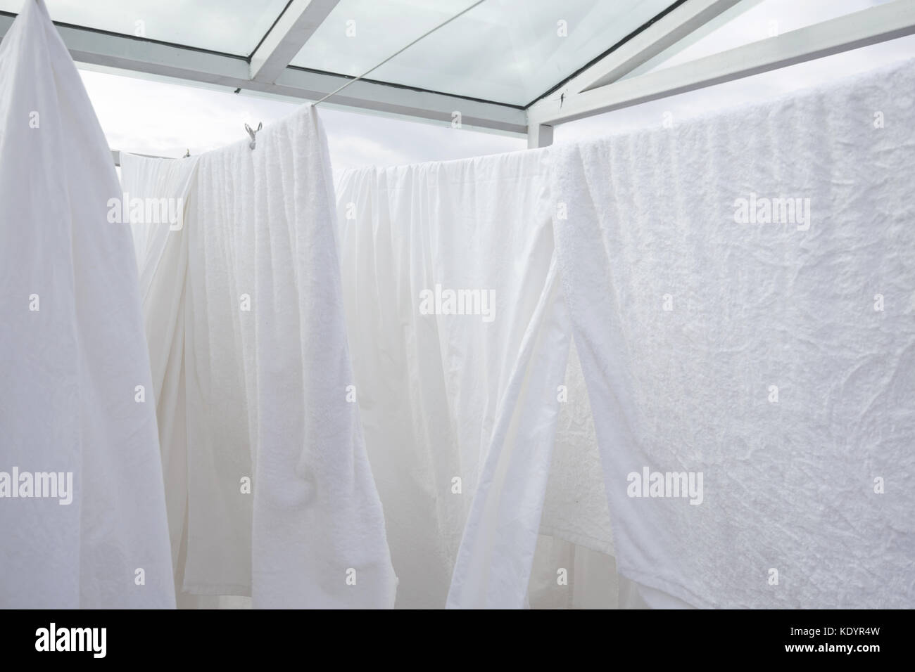 Drying white cloth Stock Photo - Alamy