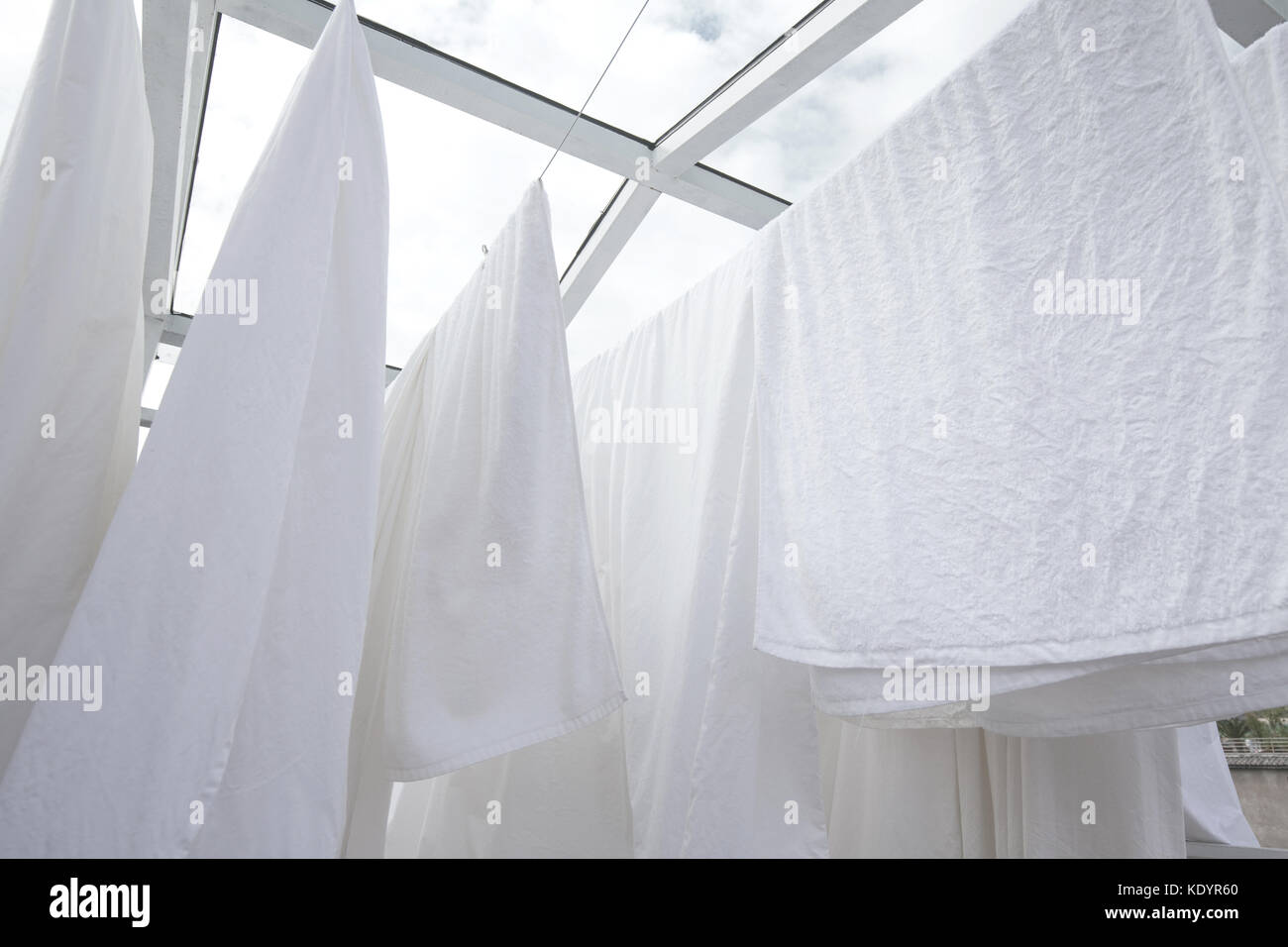 Drying white cloth Stock Photo - Alamy