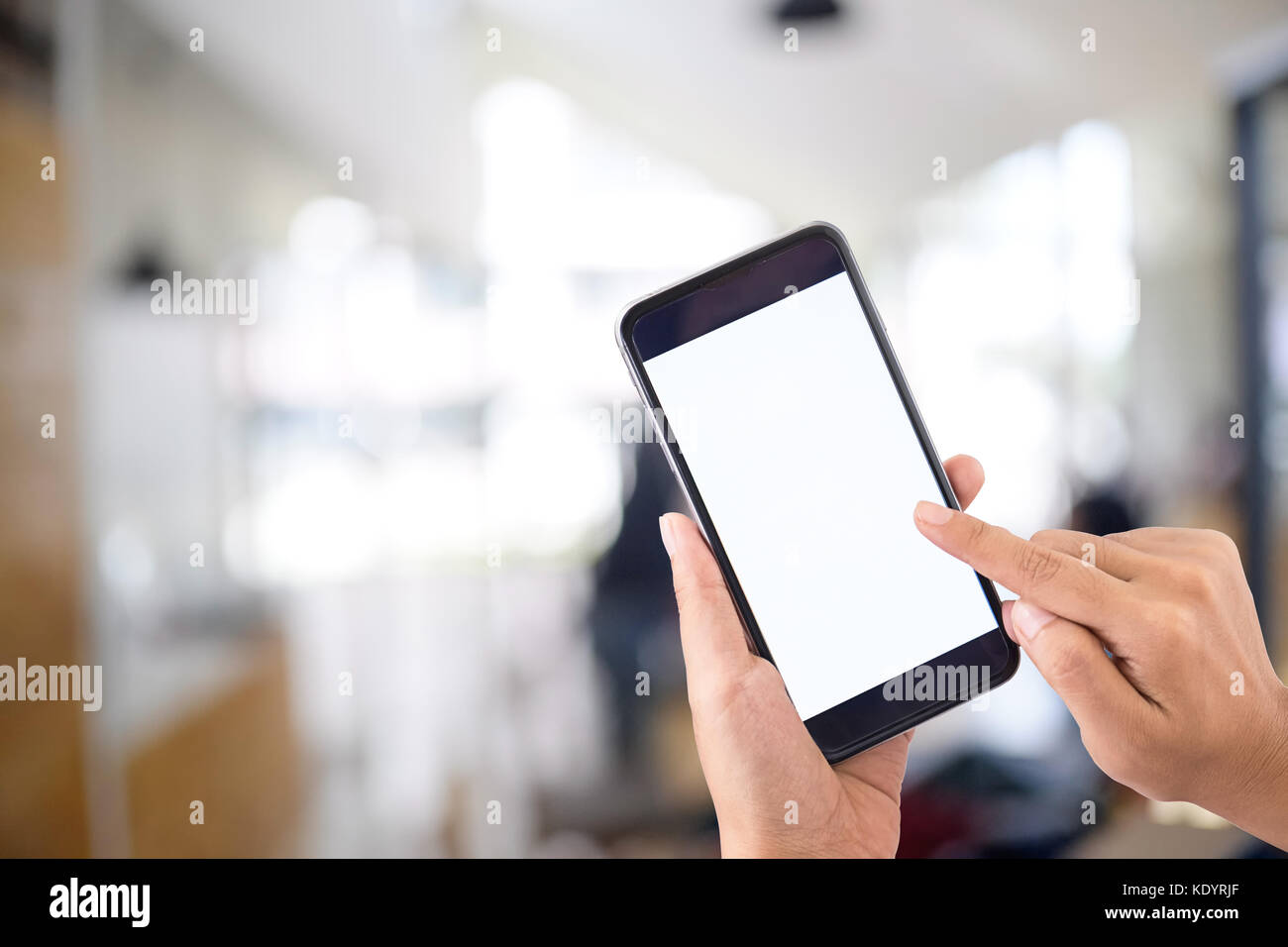 Empty smartphone on hand Stock Photo - Alamy