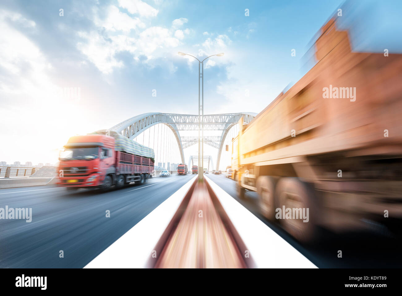 truck speeding through a bridge at sunset,motion blur Stock Photo - Alamy truck speeding through a bridge at sunset,motion blur Stock Photo - Alamy
