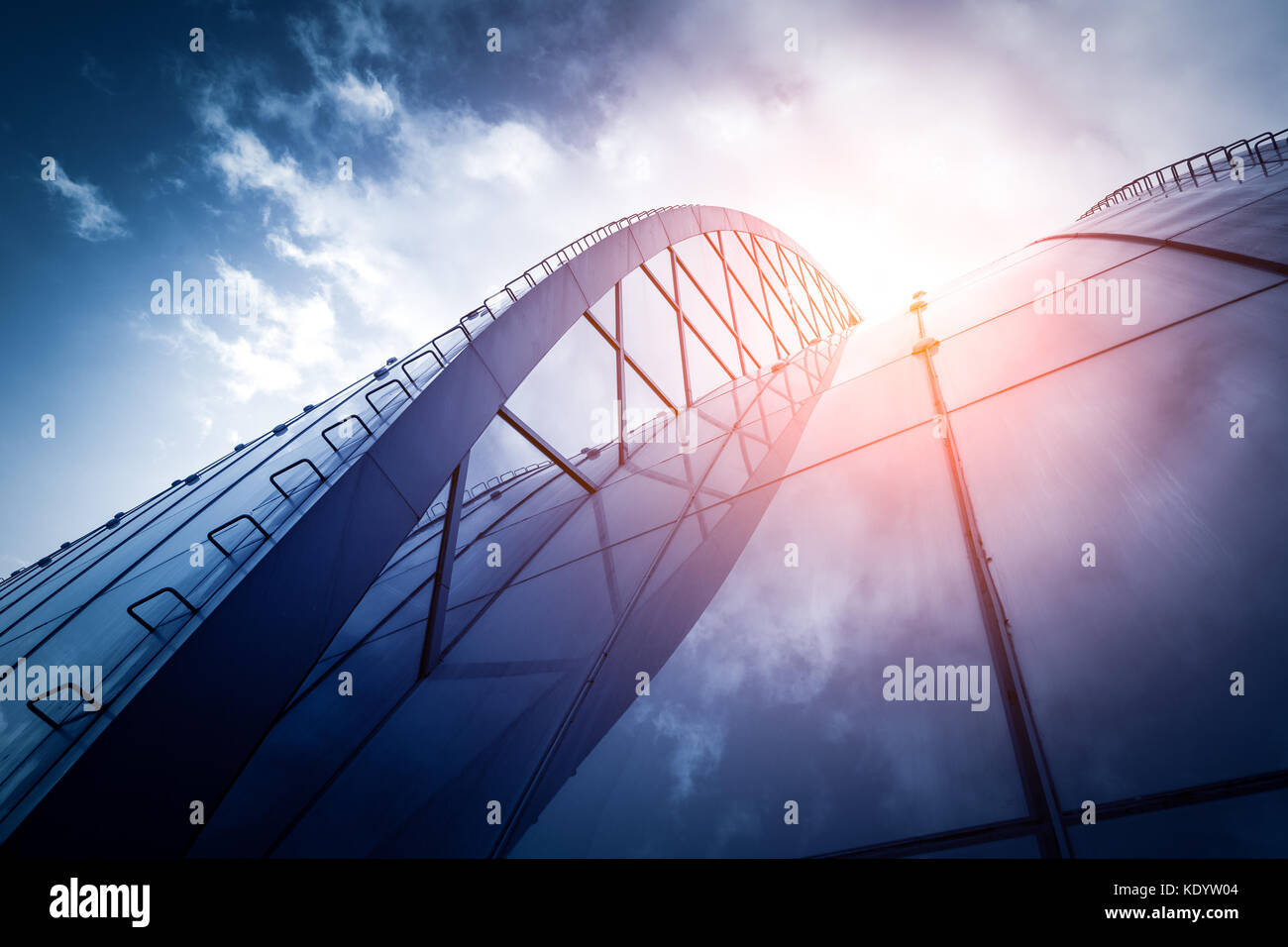 Bright outlook for business. Modern office block with sunny beautiful ...