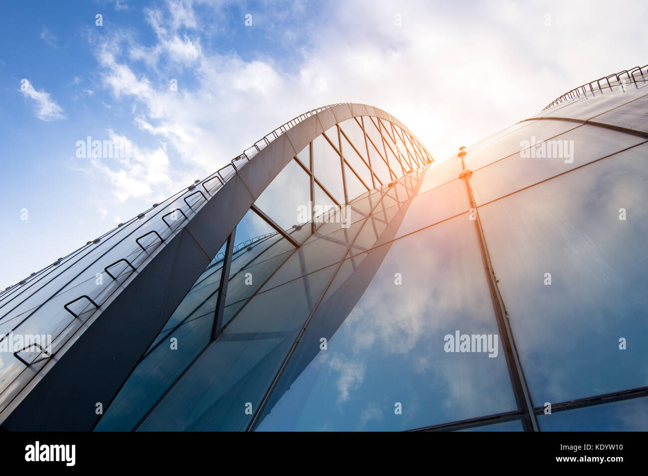 Bright outlook for business. Modern office block with sunny beautiful ...