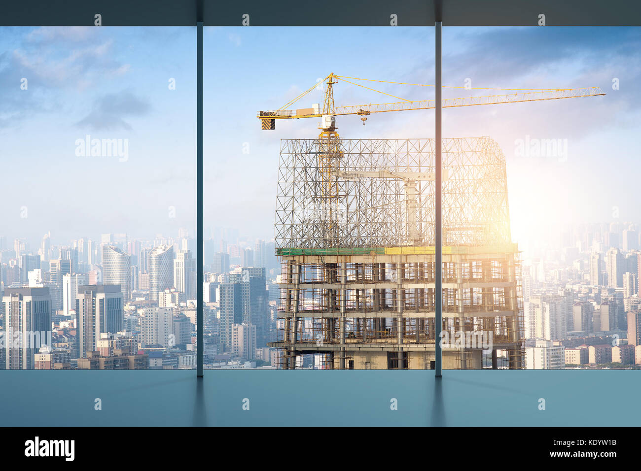 Building of a skyscraper with two tower cranes Stock Photo - Alamy