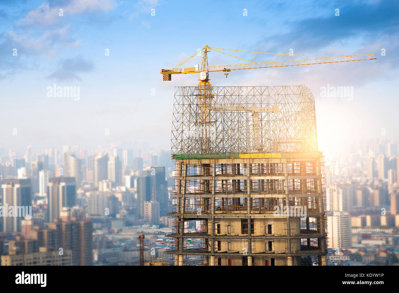 Building of a skyscraper with two tower cranes Stock Photo - Alamy
