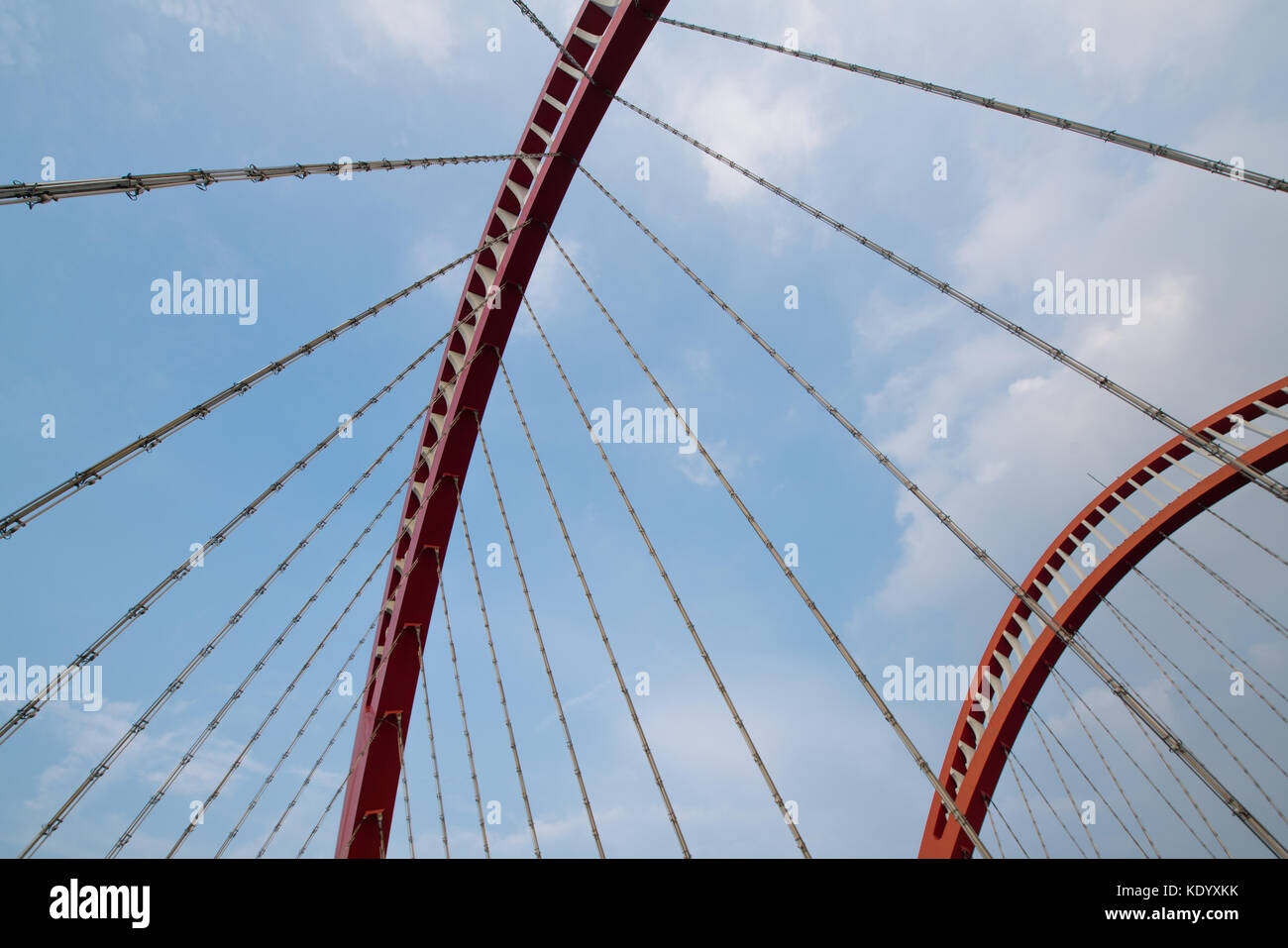 Steel construction of red bridge Stock Photo - Alamy