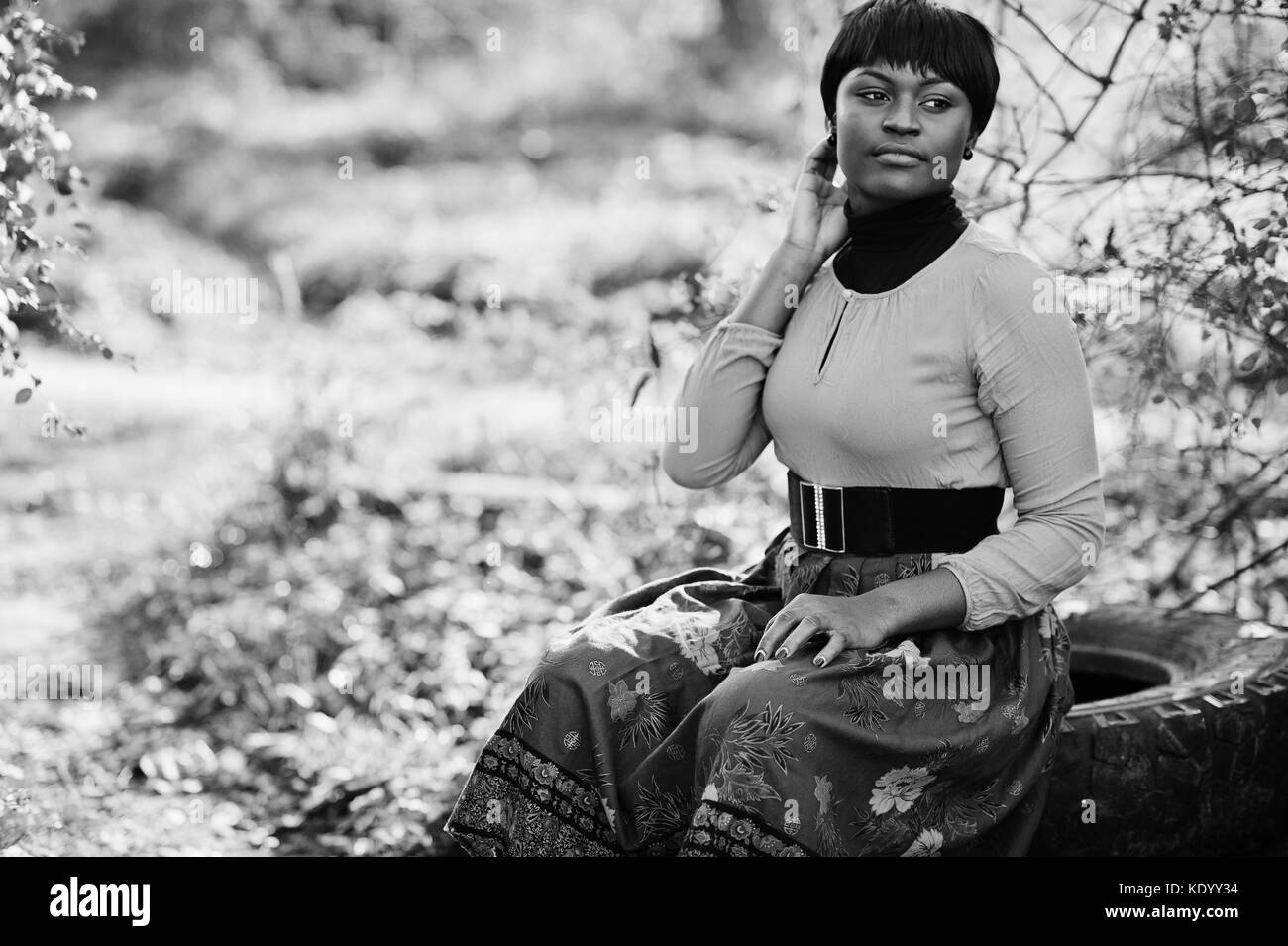African american girl at yellow and red dress at golden autumn fall ...