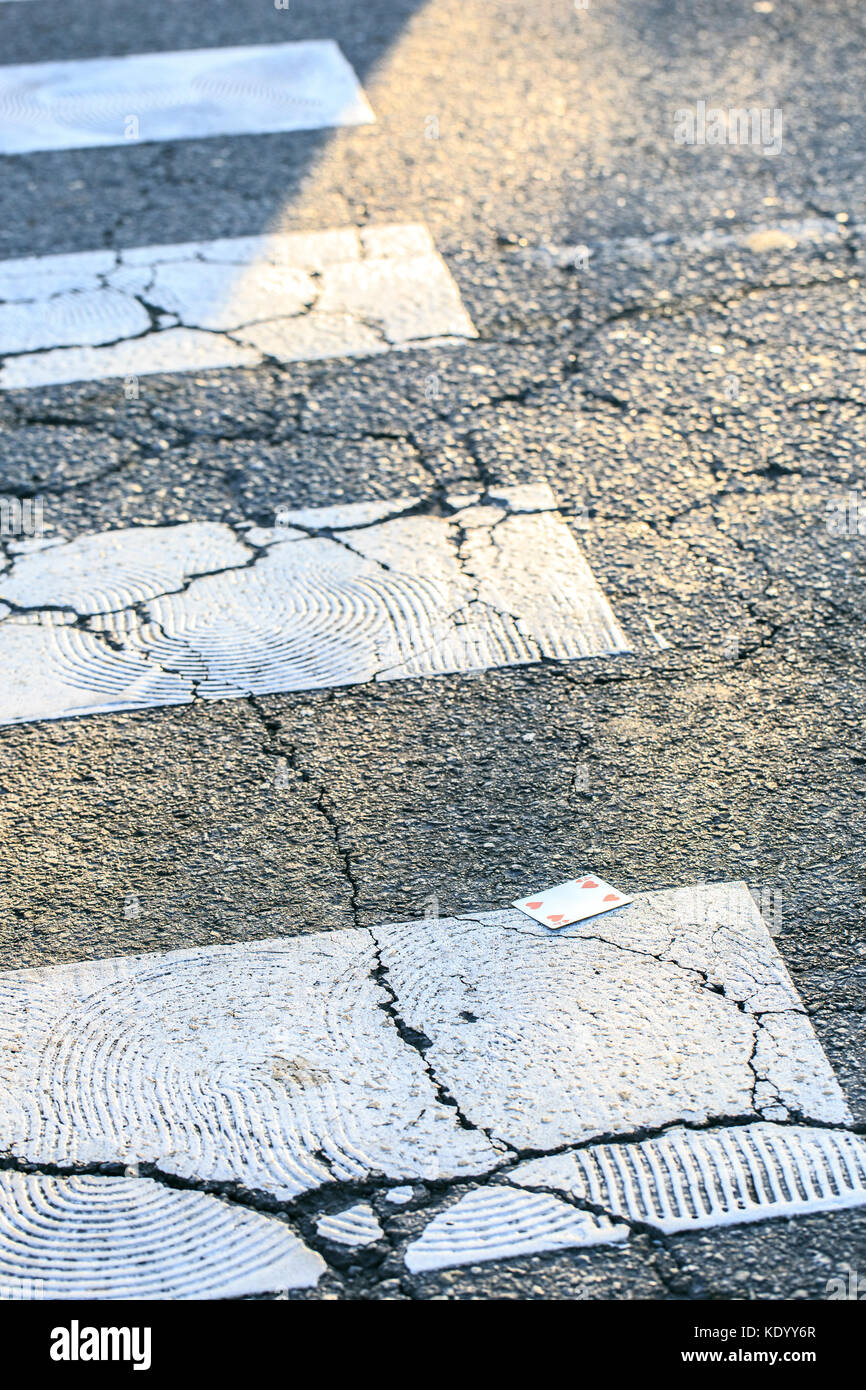 Playing cards in the street Stock Photo - Alamy
