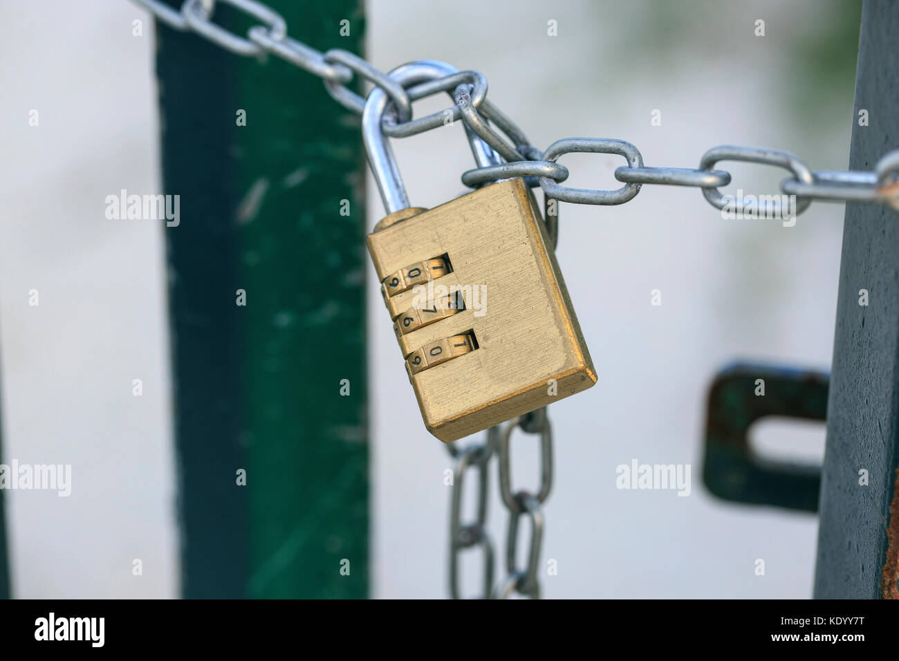 Combination lock in a door Stock Photo - Alamy