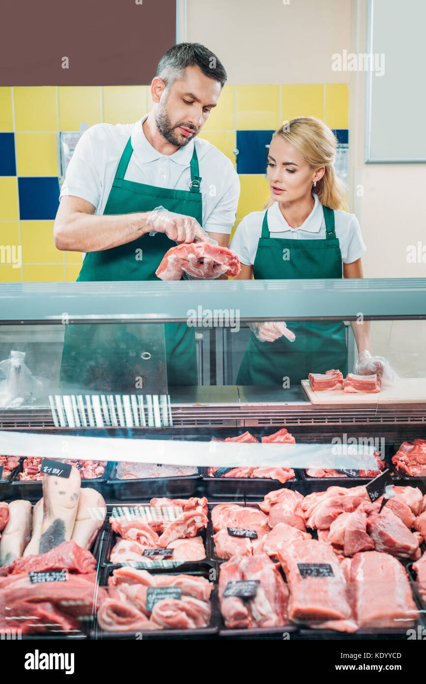 shop assistants in supermarket Stock Photo - Alamy