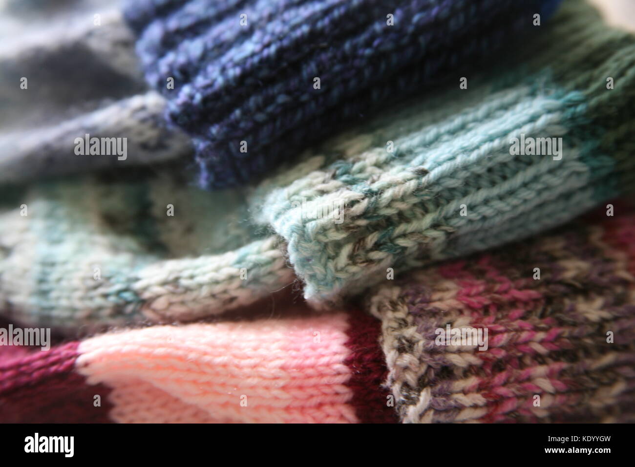 Cozy hand knitted woollen hats Stock Photo - Alamy