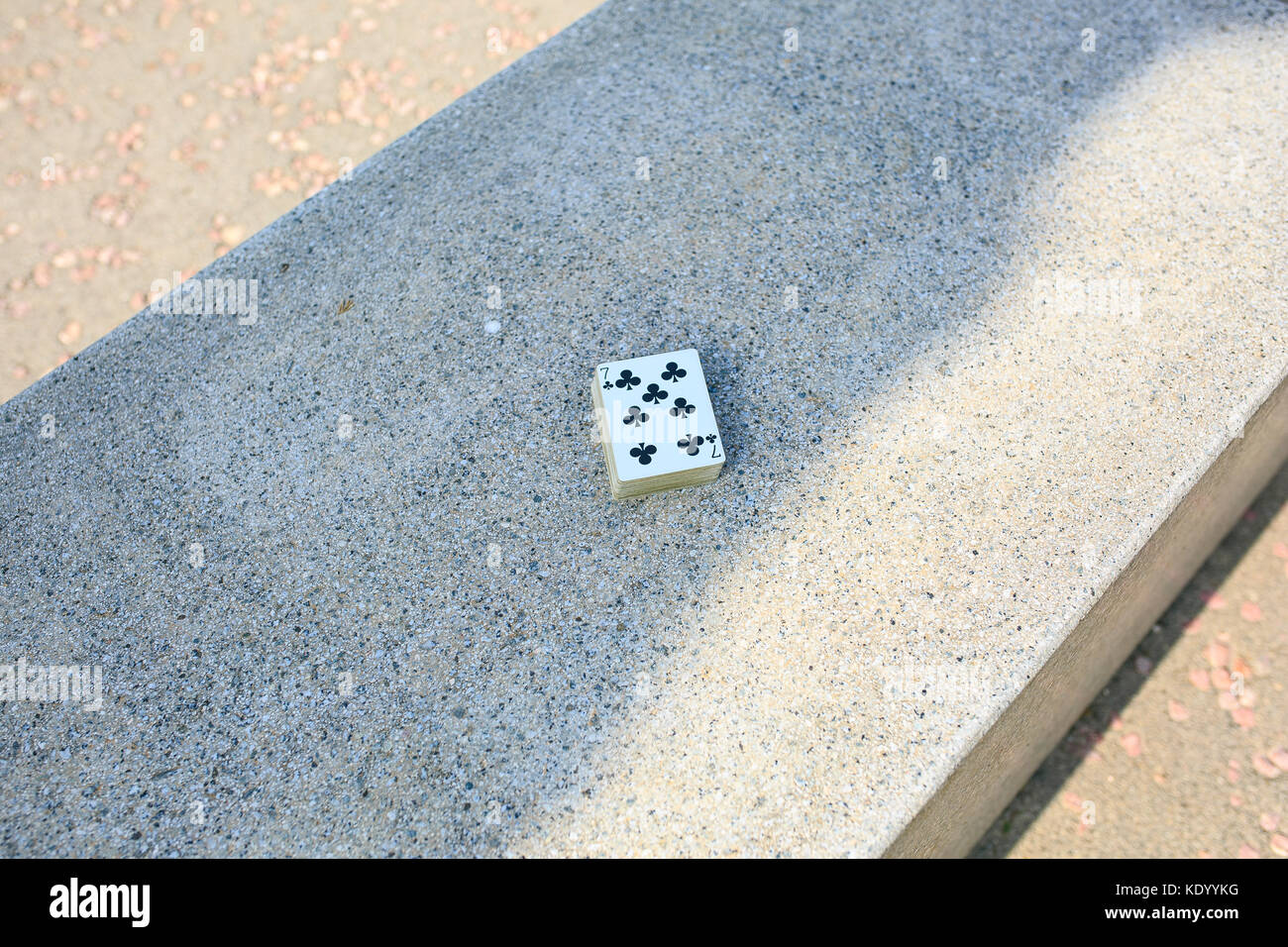 Playing cards in the street Stock Photo - Alamy