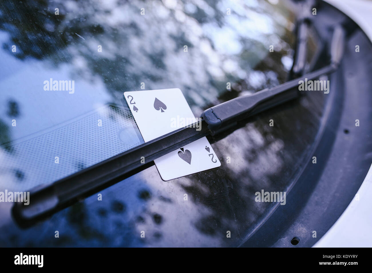 Playing cards in the street Stock Photo - Alamy