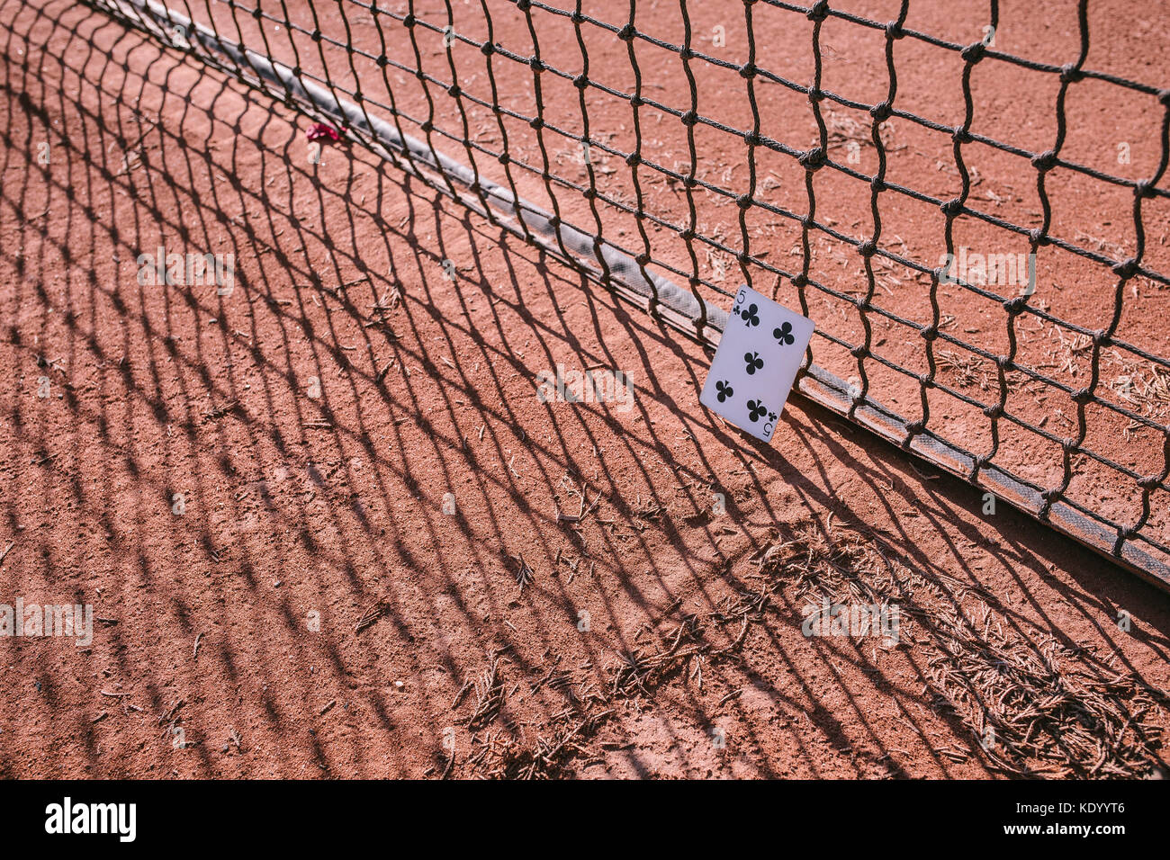 Playing cards in the street Stock Photo - Alamy