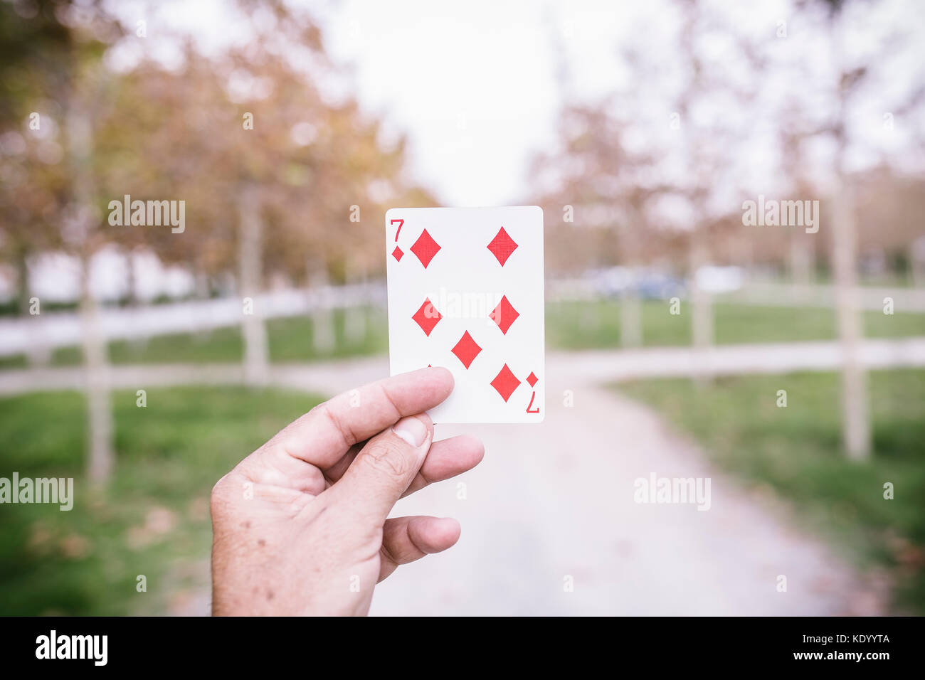 Playing cards in the street Stock Photo - Alamy