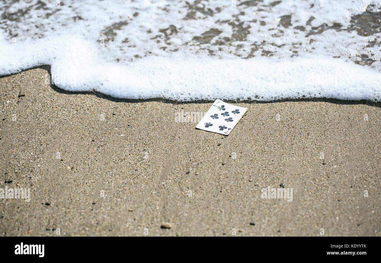 Playing cards in the street Stock Photo - Alamy