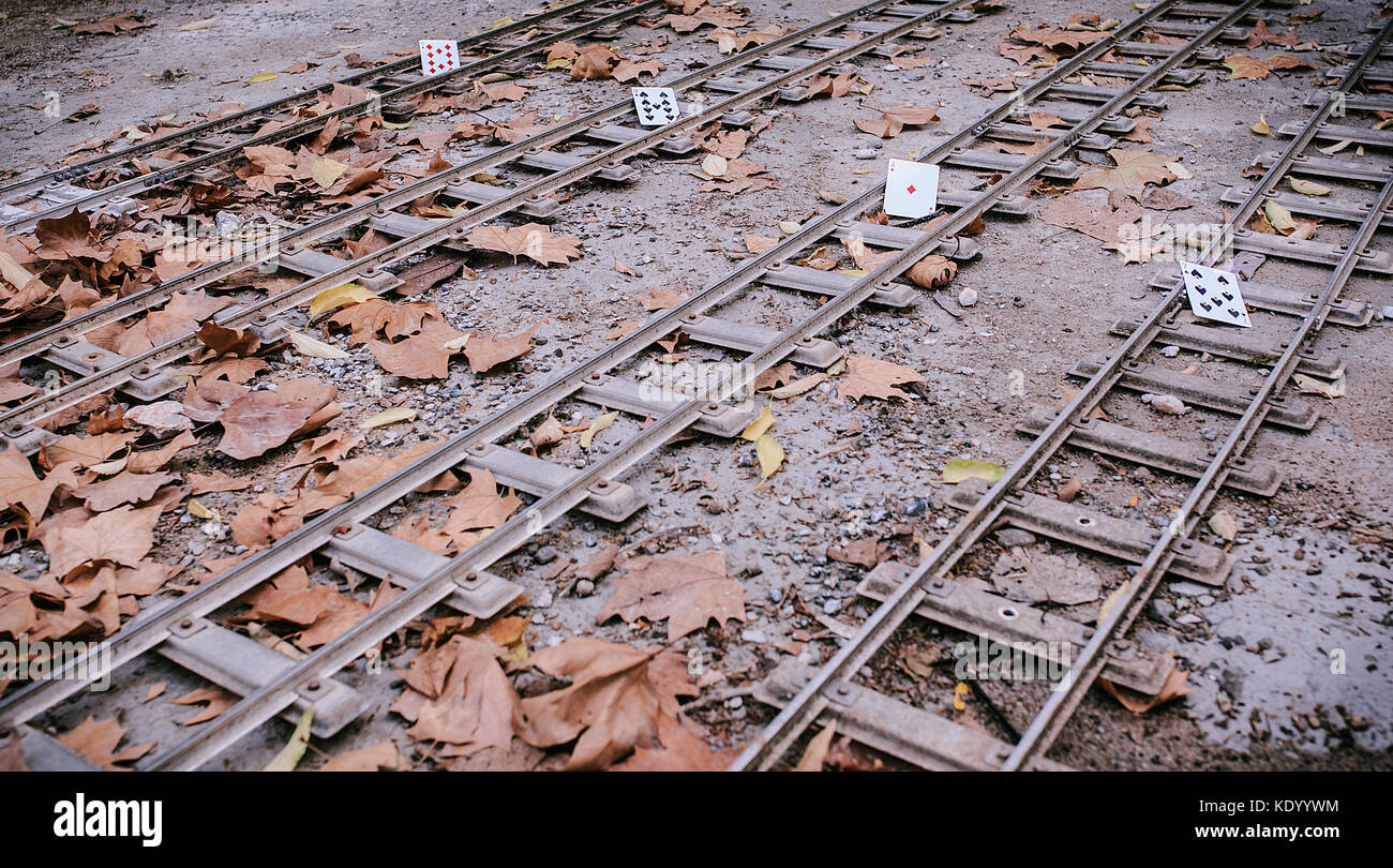 Playing cards in the street Stock Photo - Alamy